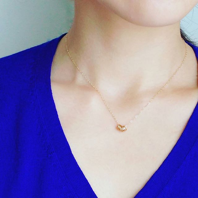 This simple necklace will add a special little something to your ...